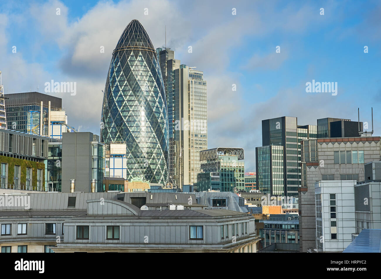 St Marys Axe or the Gerkin building dominates the London skyline Stock ...