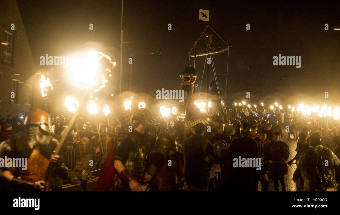 The Guizer Jarl Lyall Gair and his squad light up and march their ...