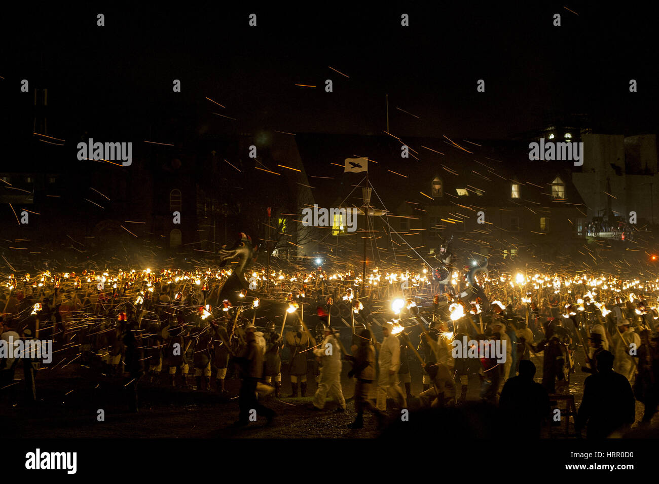 The Guizer Jarl Lyall Gair and his squad light up and march their ...
