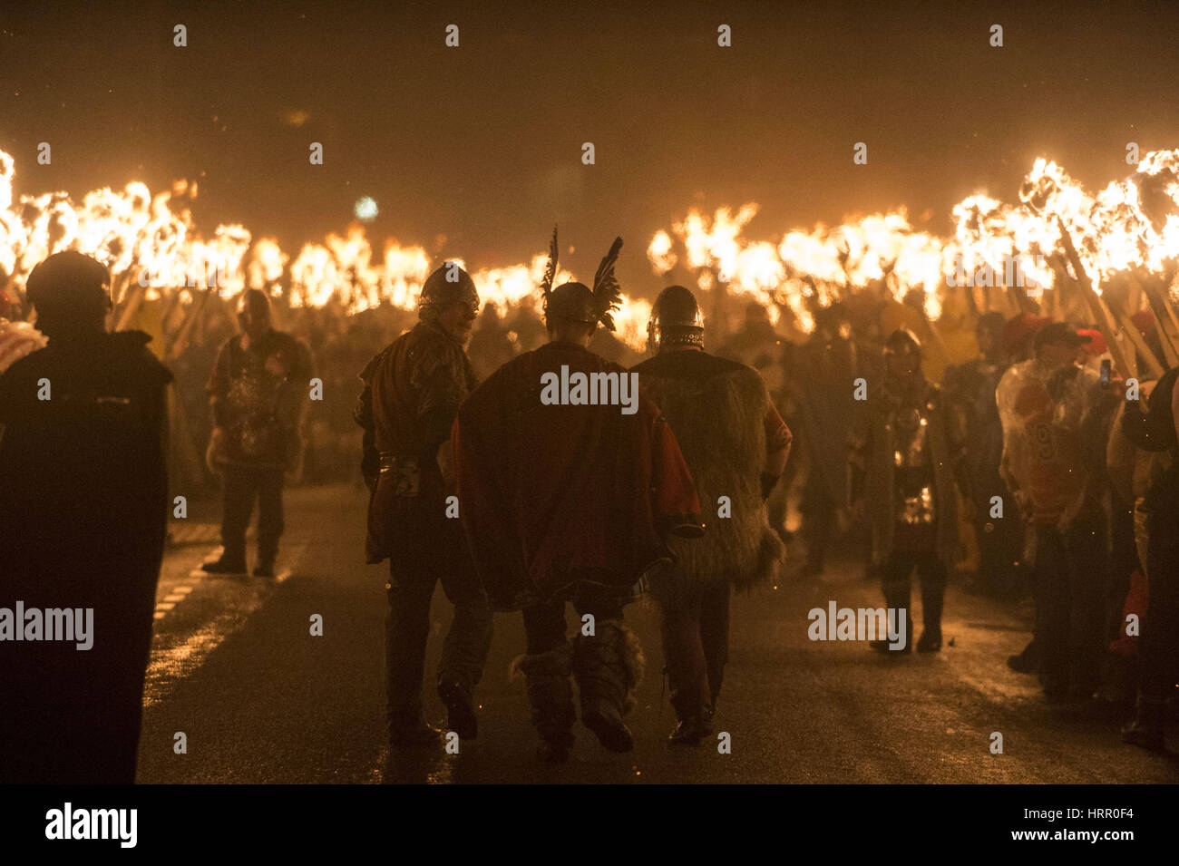 The Guizer Jarl Lyall Gair and his squad light up and march their ...