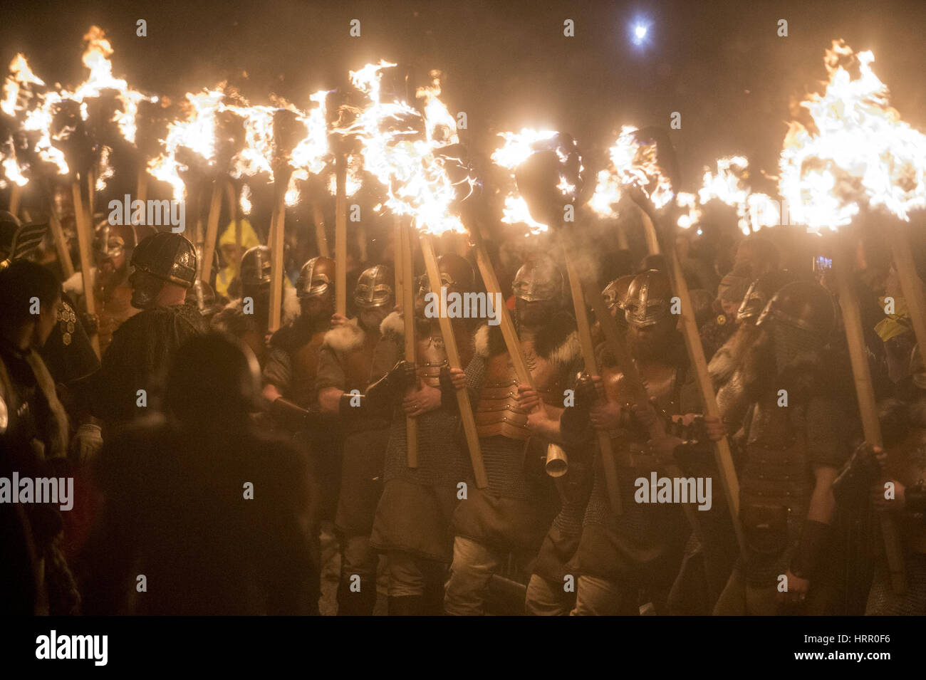 The Guizer Jarl Lyall Gair and his squad light up and march their ...