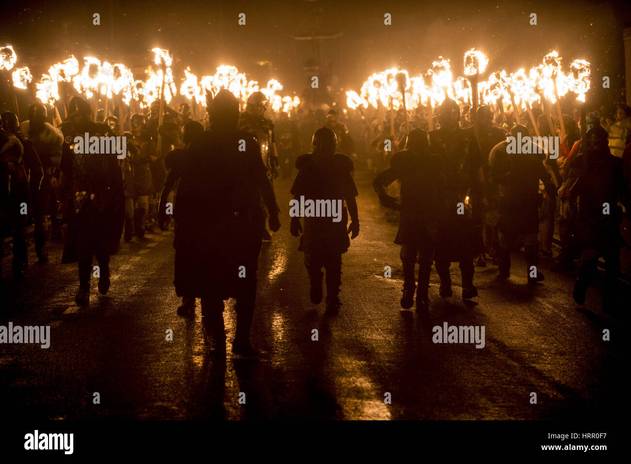 The Guizer Jarl Lyall Gair and his squad light up and march their ...
