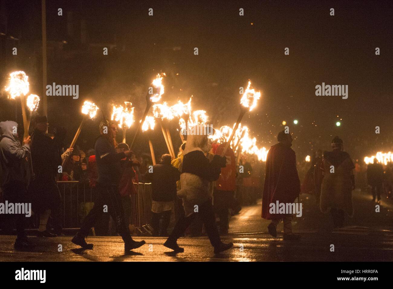 The Guizer Jarl Lyall Gair and his squad light up and march their ...