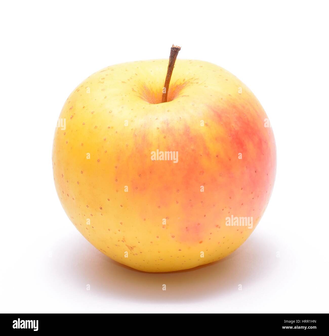 Ripe yellow apple isolated on white Stock Photo - Alamy