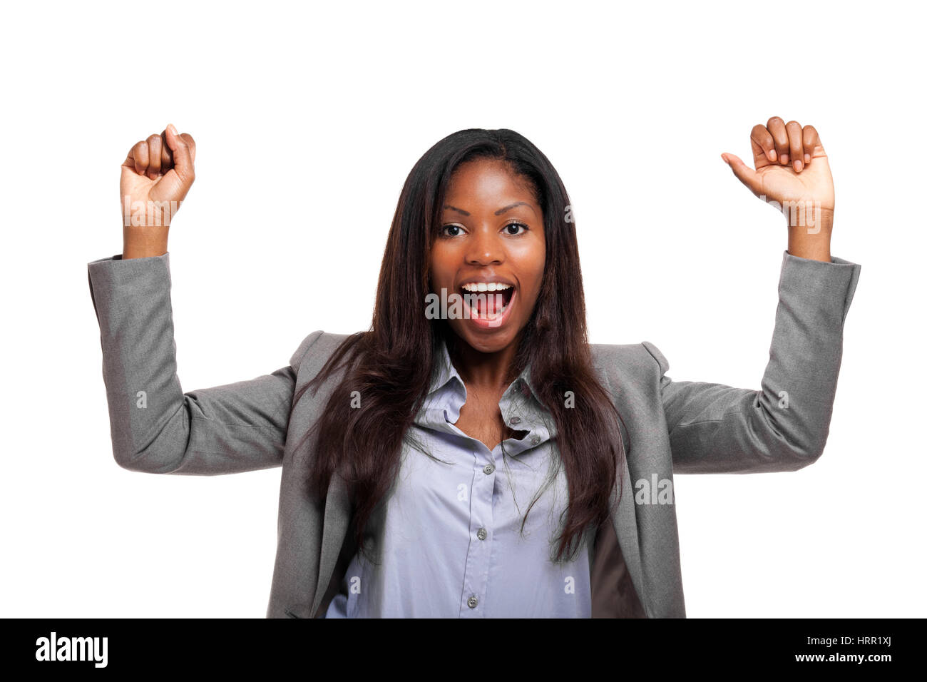Afro businesswoman raising arms in sign of victory Stock Photo - Alamy