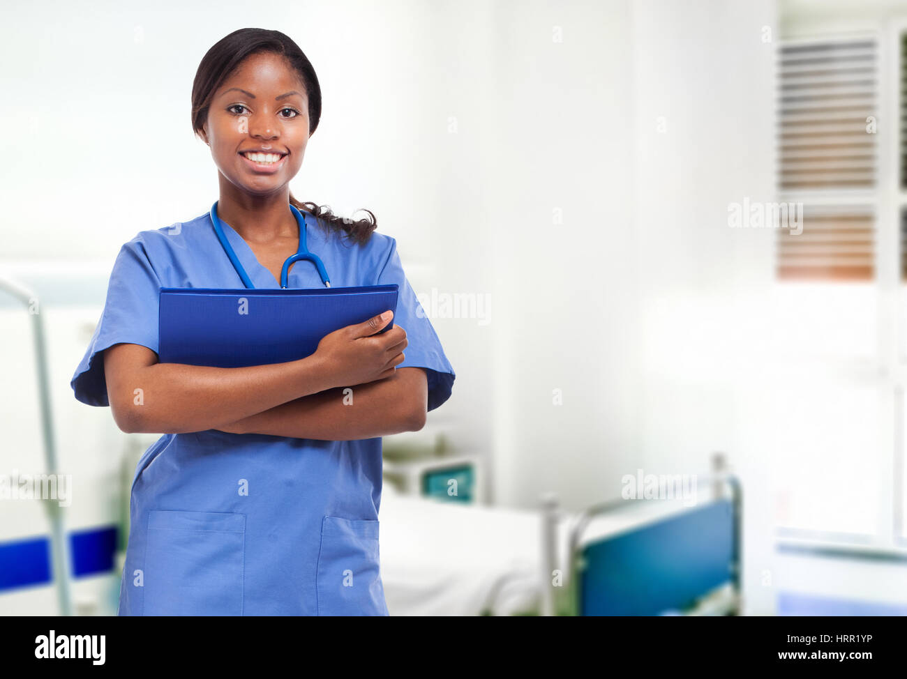 Smiling black nurse at the hospital Stock Photo - Alamy