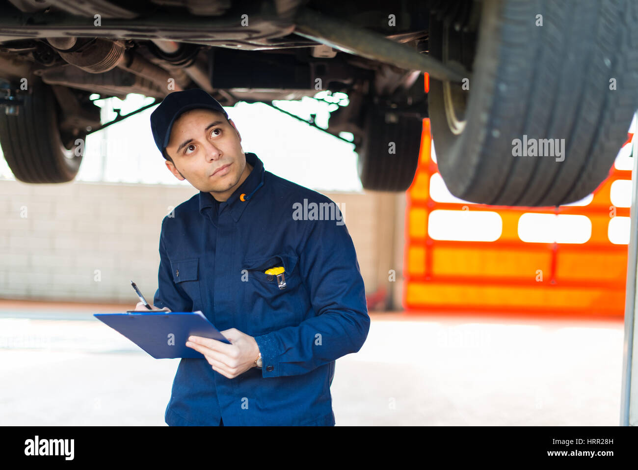 Mechanic works car part hi-res stock photography and images - Alamy