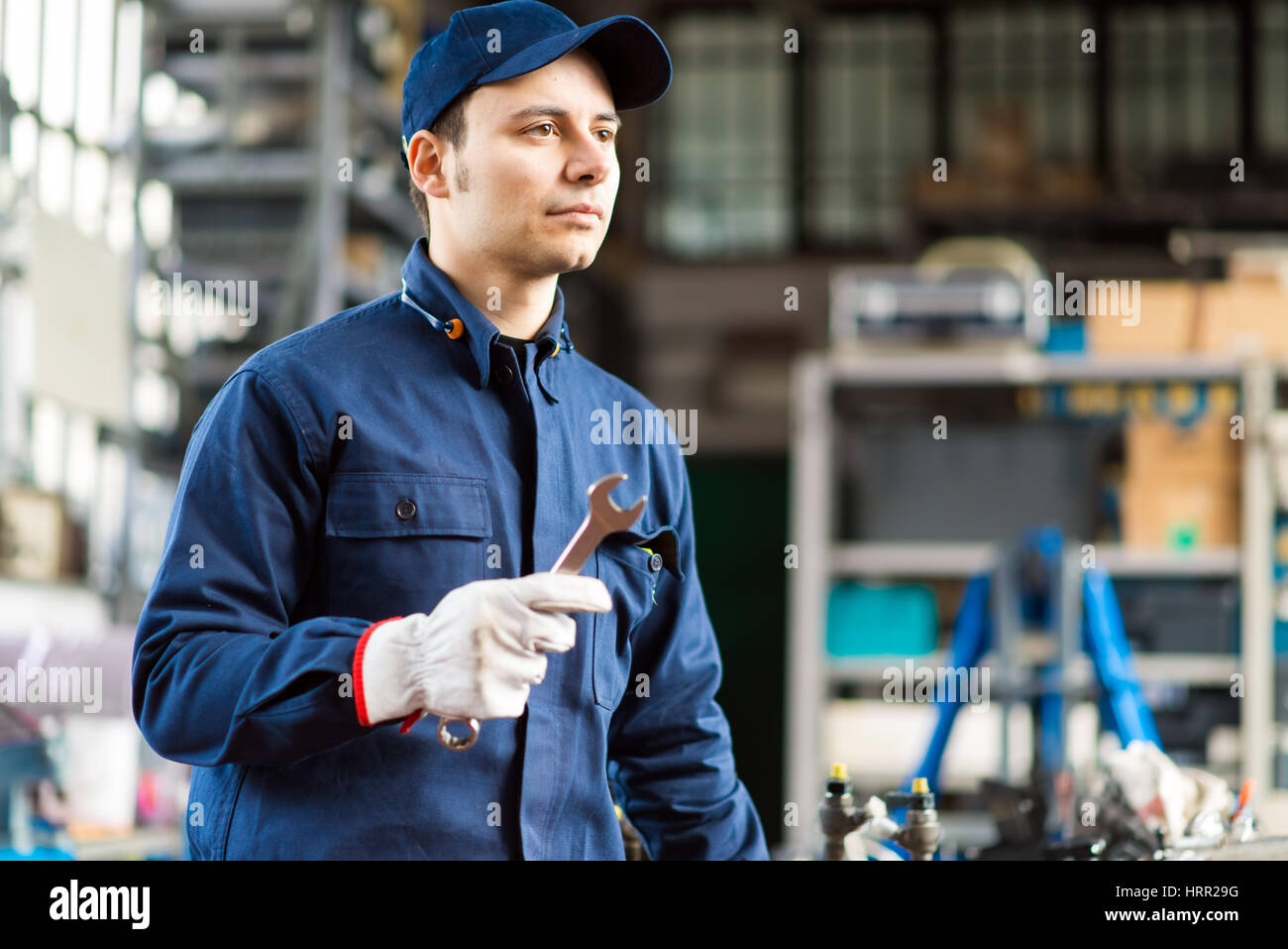 Checking mechanic in coveralls hi-res stock photography and images - Alamy