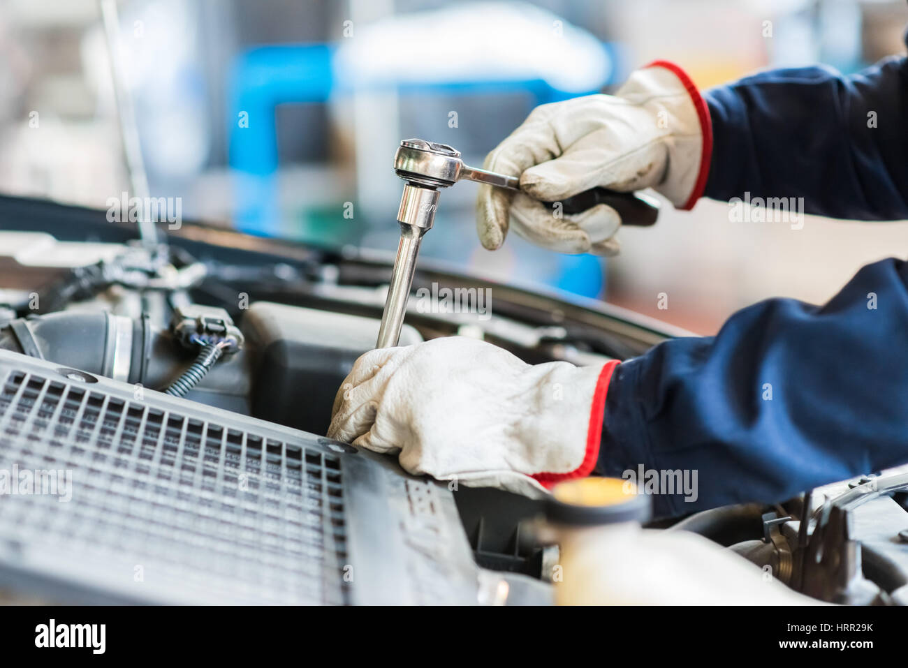 Mechanic repairing a car Stock Photo - Alamy