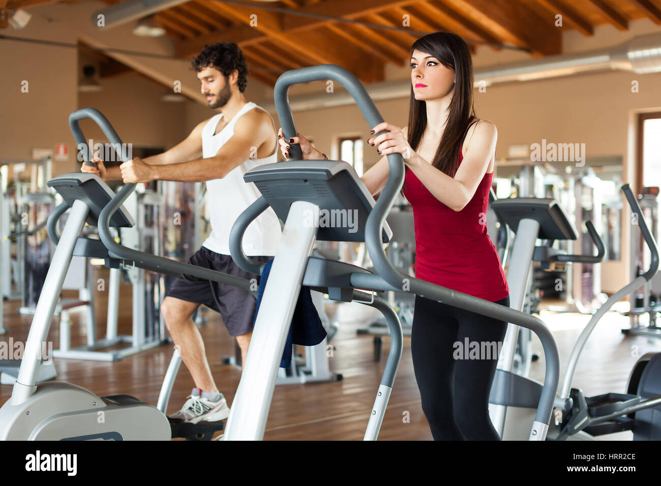 Group of people running on treadmills Stock Photo - Alamy