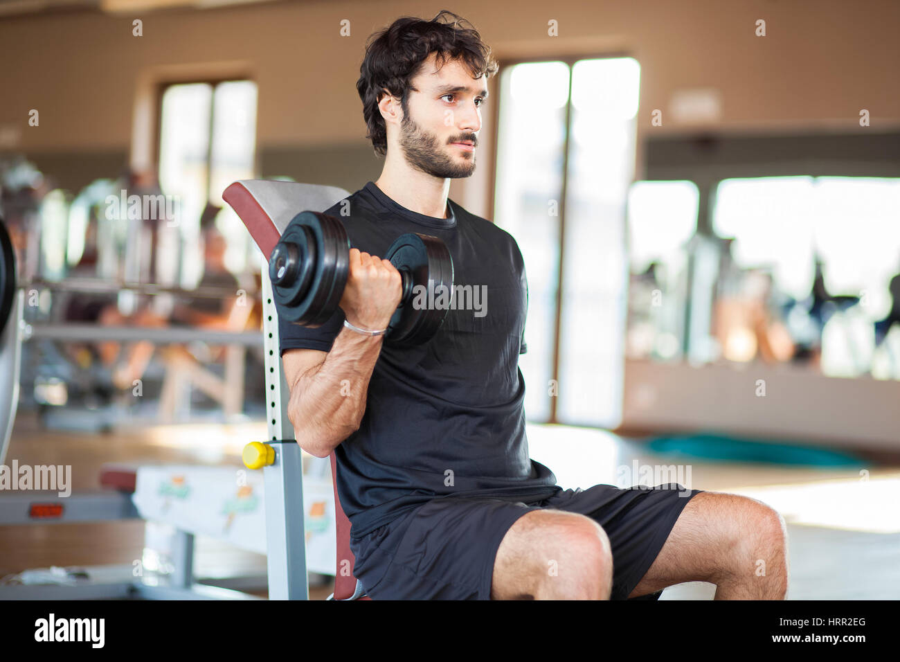Man training in a gym Stock Photo - Alamy