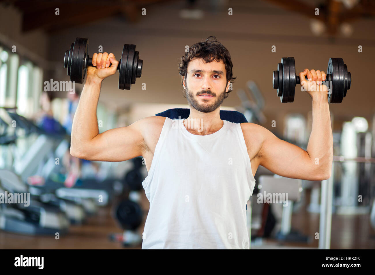 Man training in a gym Stock Photo - Alamy