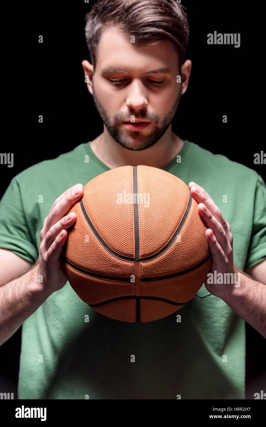Pensive sportsman basketball ball hi-res stock photography and images ...