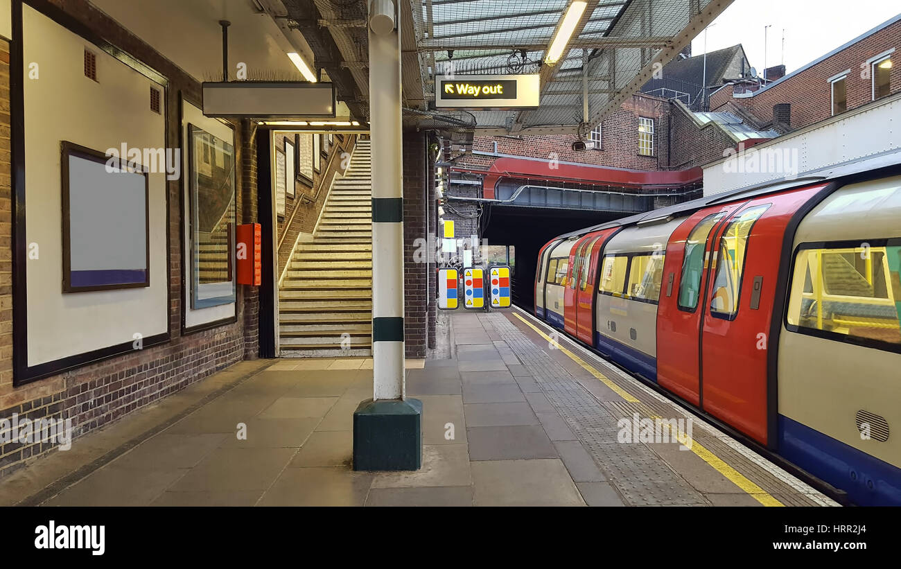 traditional underground station and train in motion. London city ...