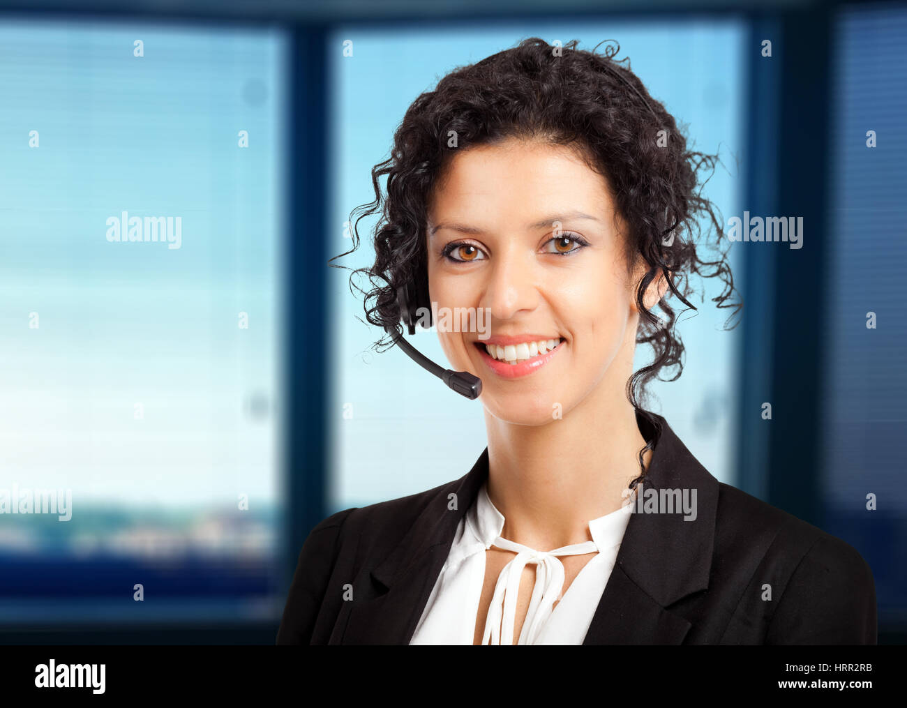 Portrait of a beautiful girl with headset Stock Photo - Alamy