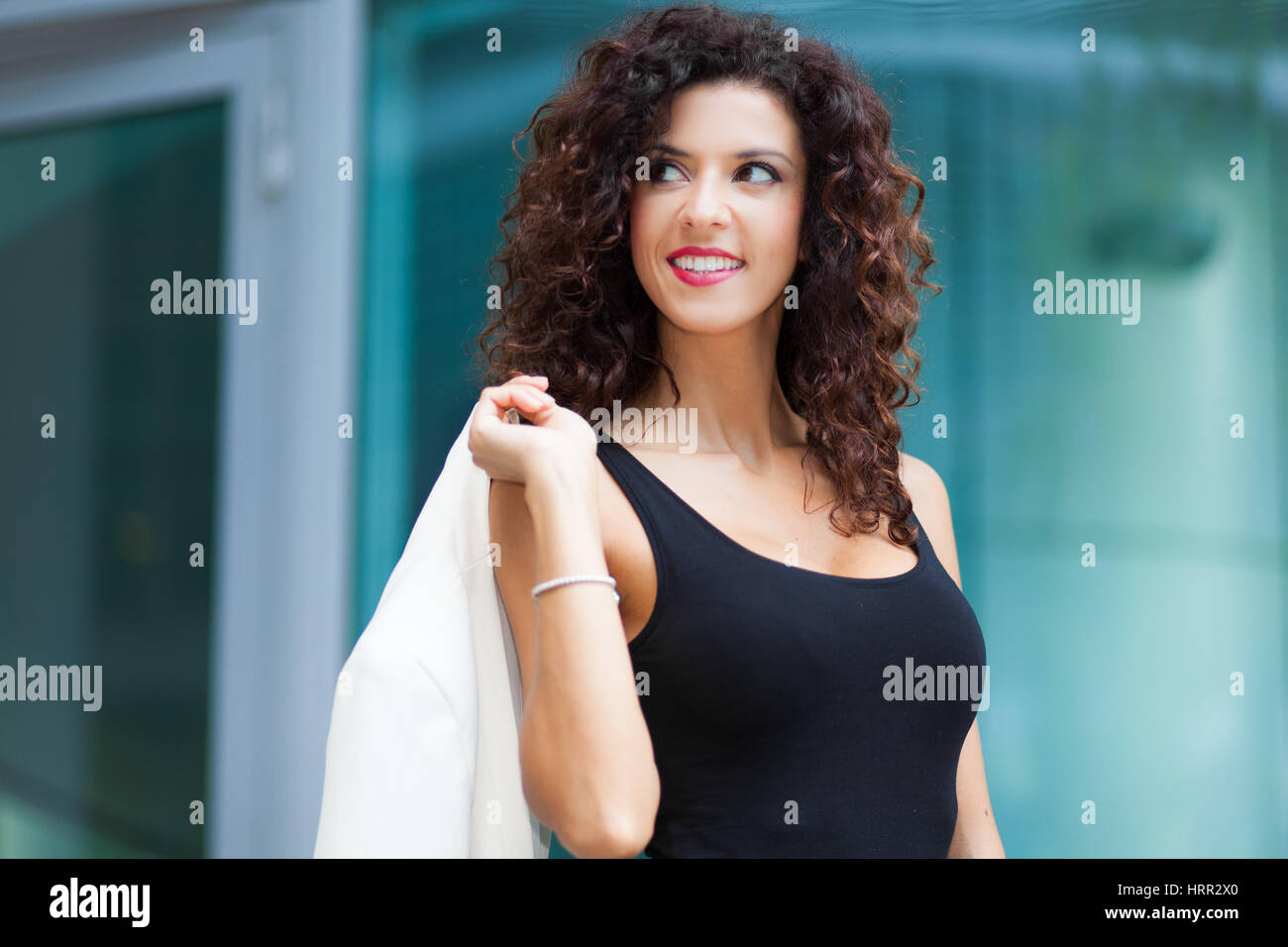 Young woman shopping outdoor Stock Photo - Alamy