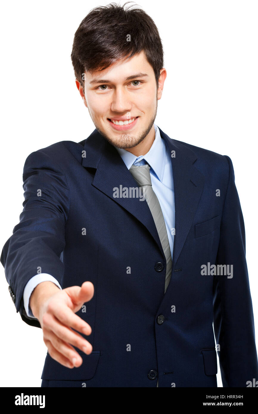 Young business man giving his hand Stock Photo - Alamy
