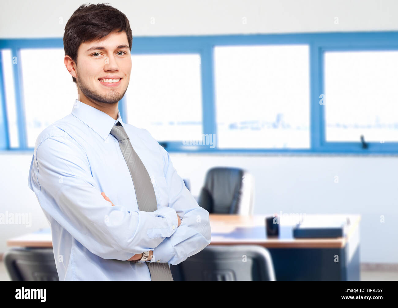 Male manager in his office Stock Photo - Alamy
