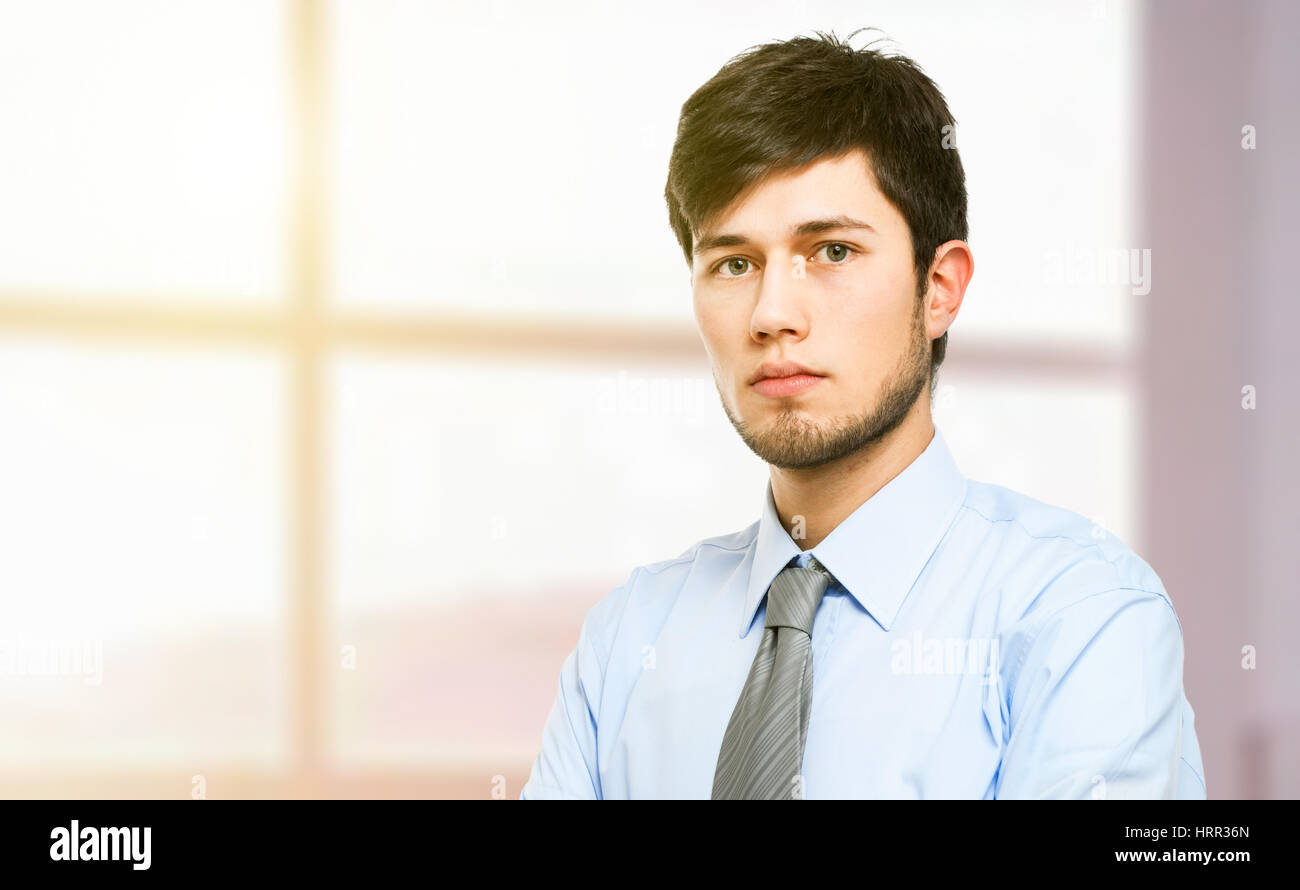Handsome businessman in the office Stock Photo - Alamy