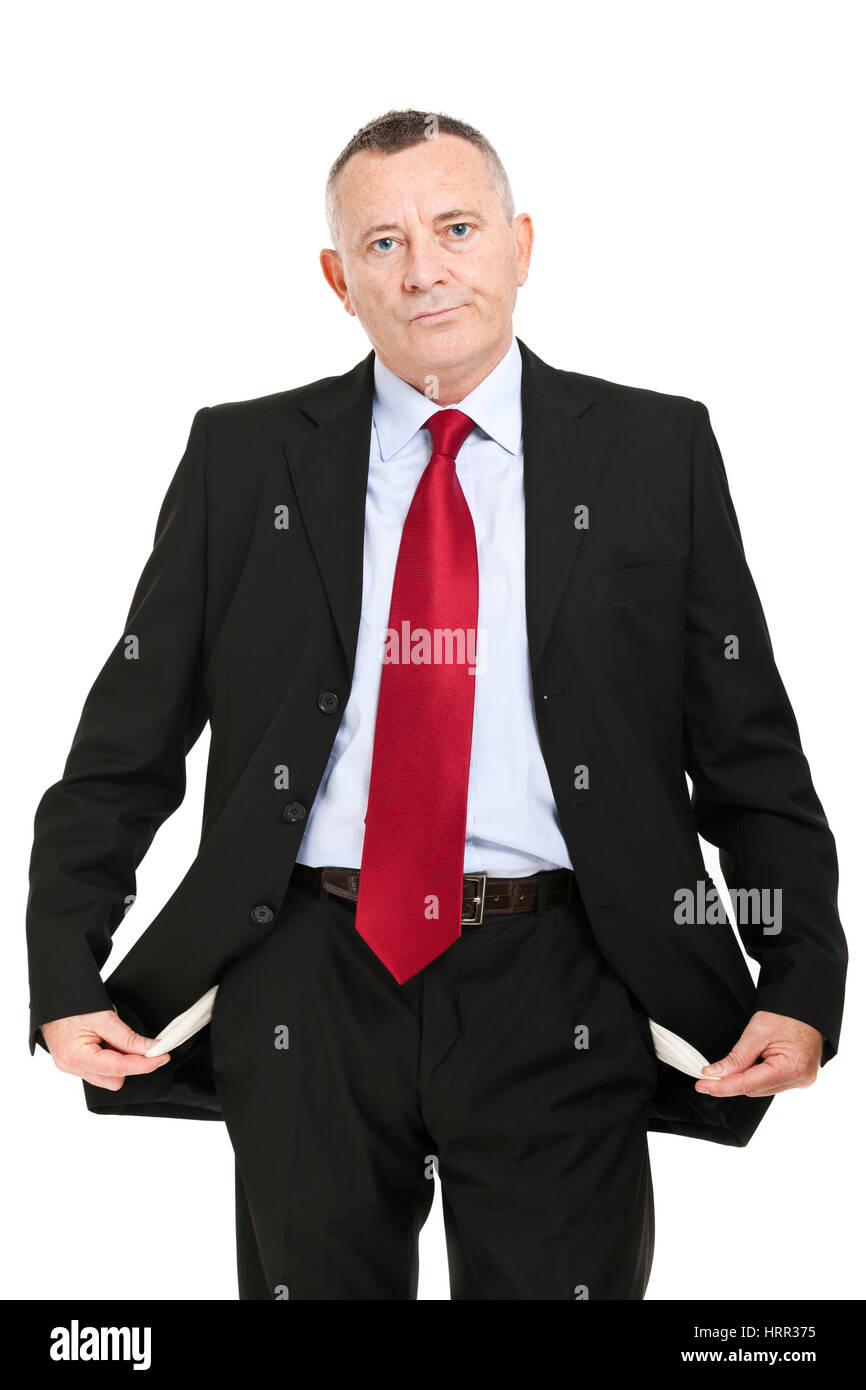 Elder businessman turning out empty pockets isolated on white Stock ...