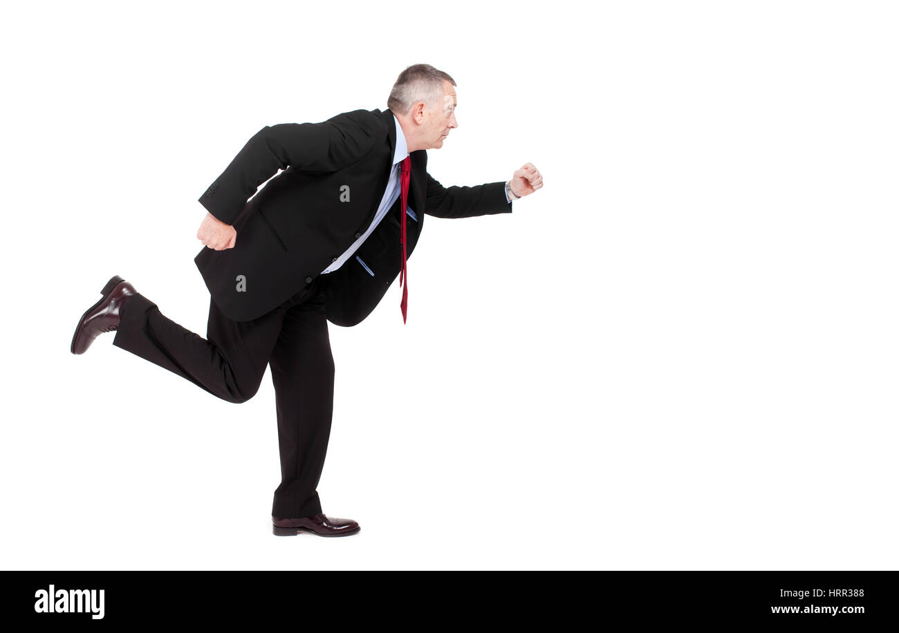 Mature businessman on go Cut Out Stock Images & Pictures - Alamy