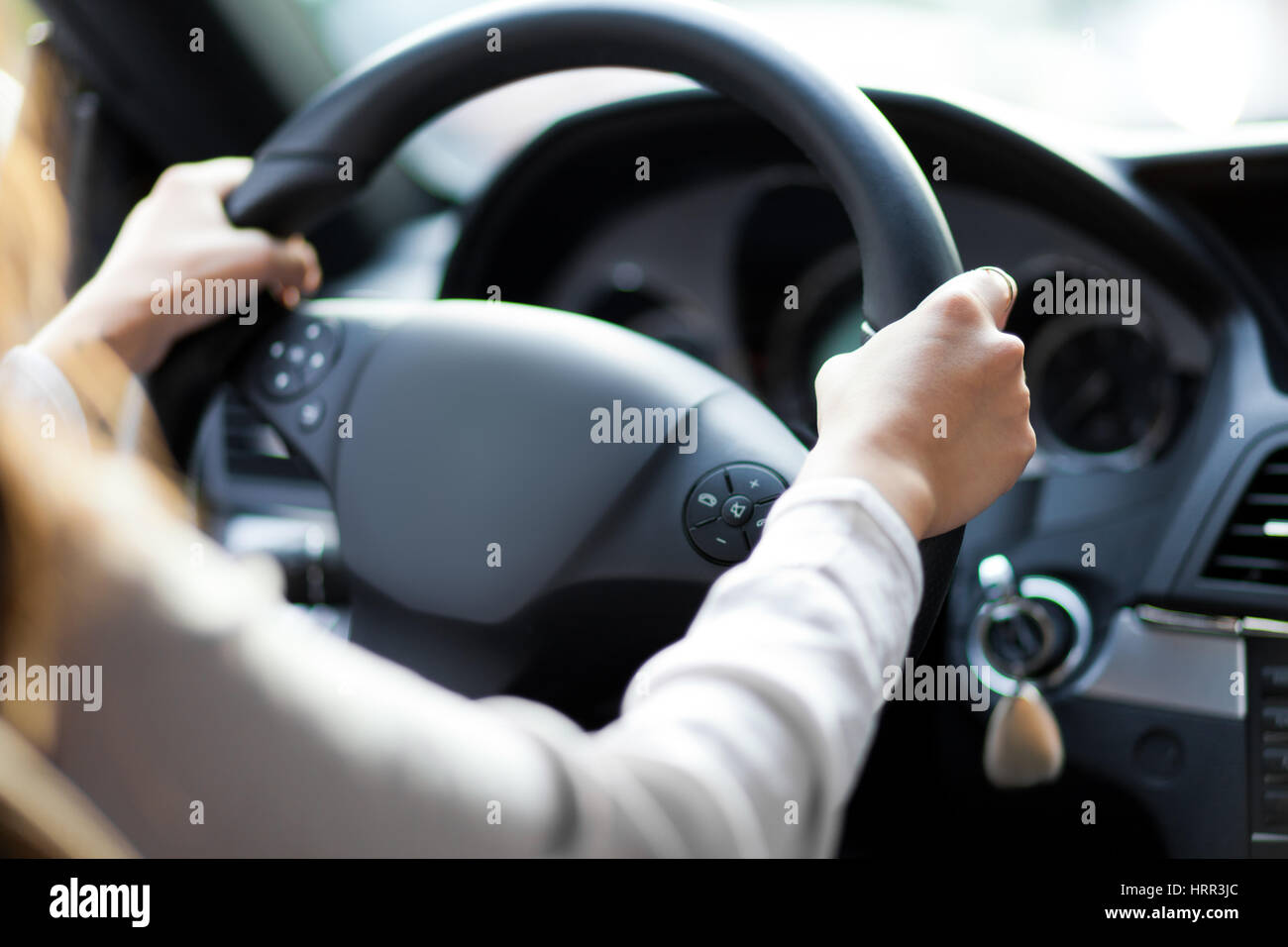 Woman driving her car Stock Photo - Alamy