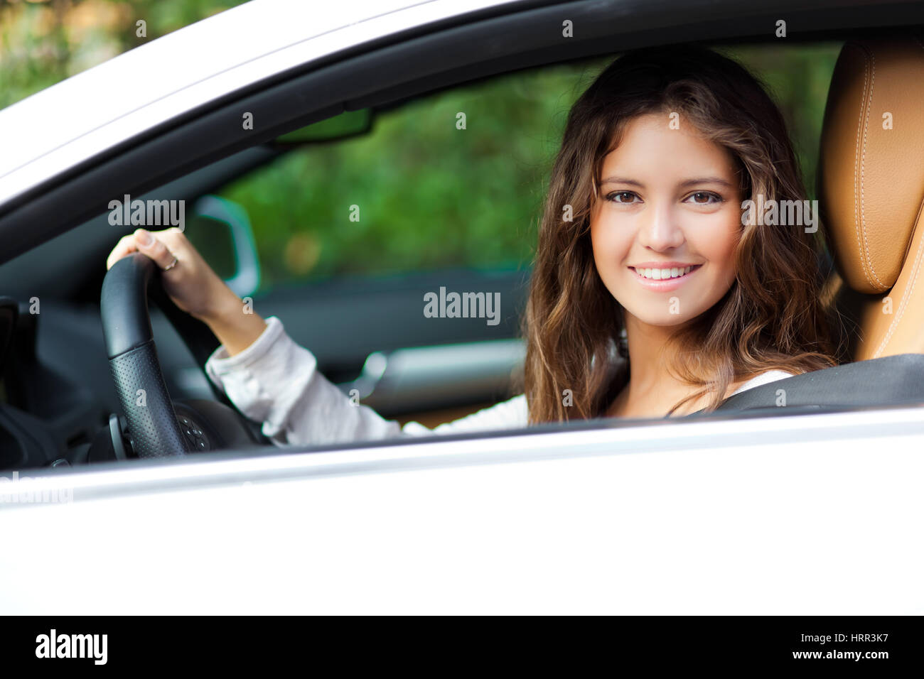 Woman driving her car Stock Photo - Alamy