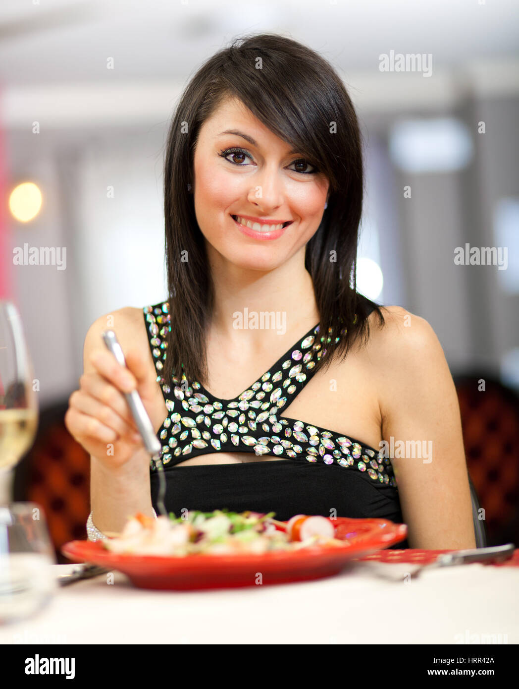 Woman having a dinner in a luxury restaurant Stock Photo - Alamy