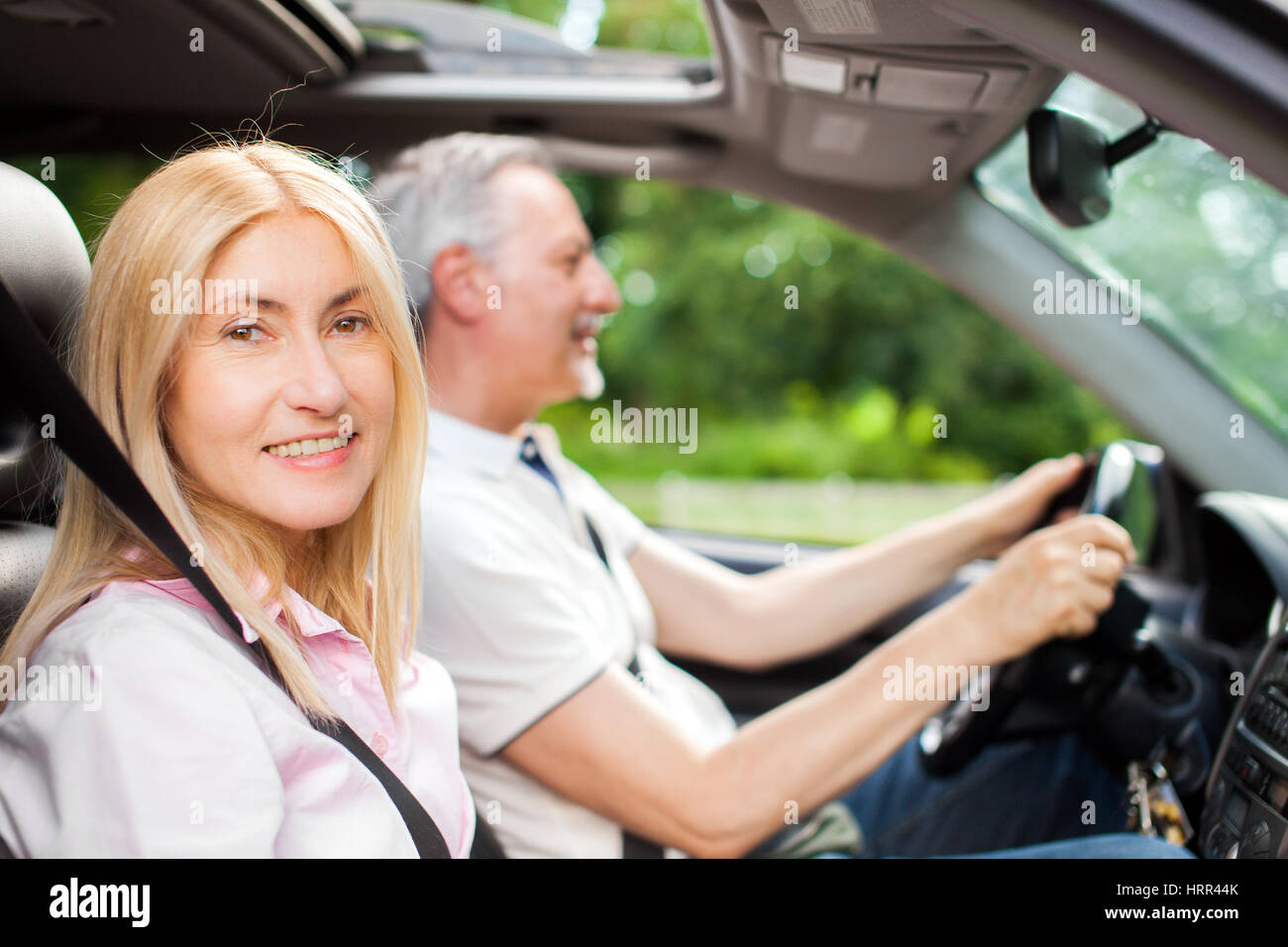 Mature couple in a car Stock Photo - Alamy