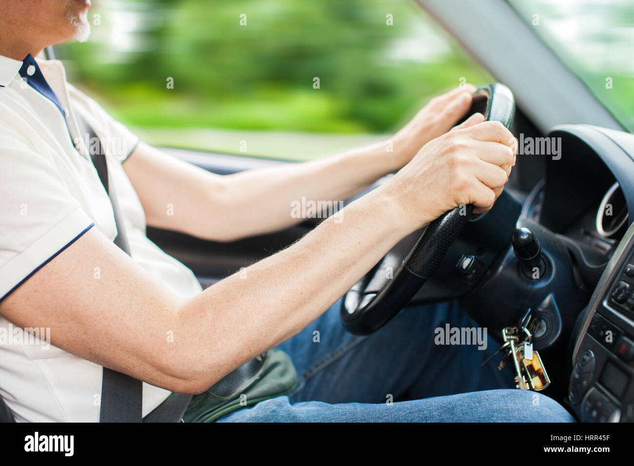Portrait of a man driving his car Stock Photo - Alamy