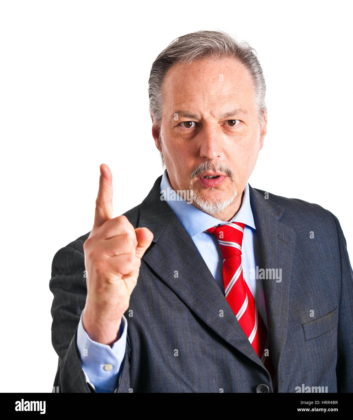 Smiling businessman pointing up his finger Stock Photo - Alamy