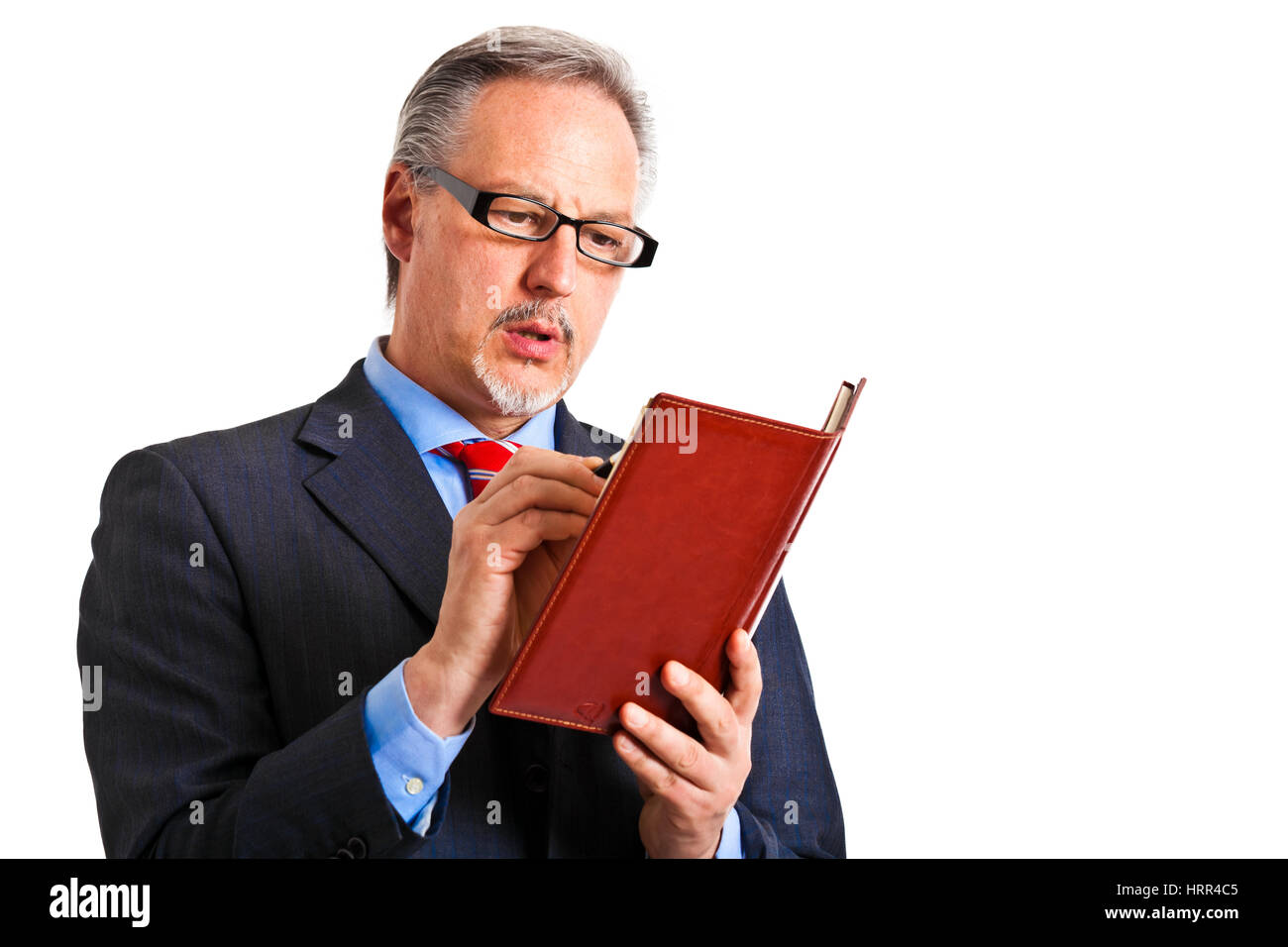 Smiling old man writing hi-res stock photography and images - Alamy