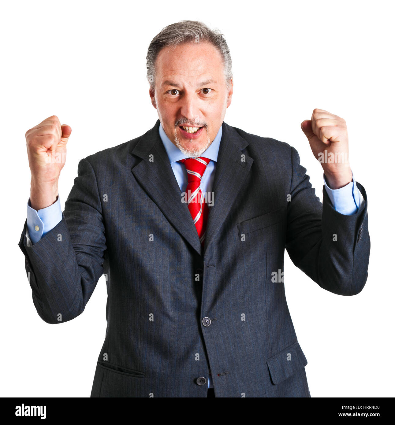 Businessman raising his hands in sign of victory Stock Photo - Alamy