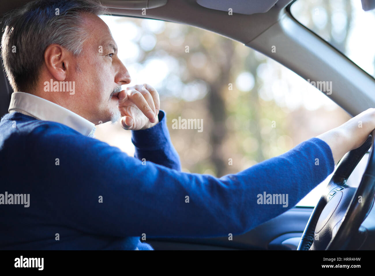 Man driving his car Stock Photo - Alamy