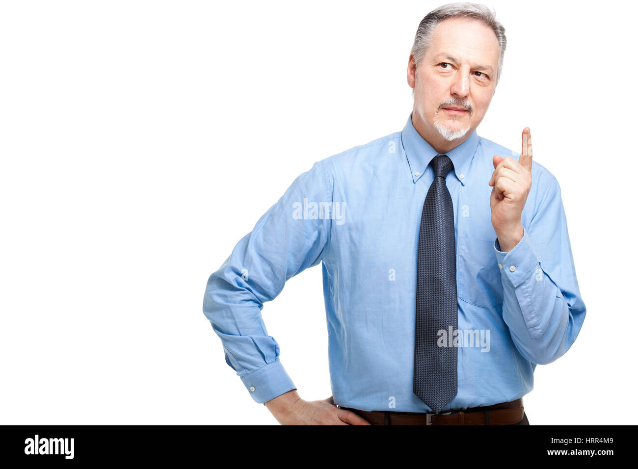 Senior manager pointing his finger up isolated on white Stock Photo - Alamy