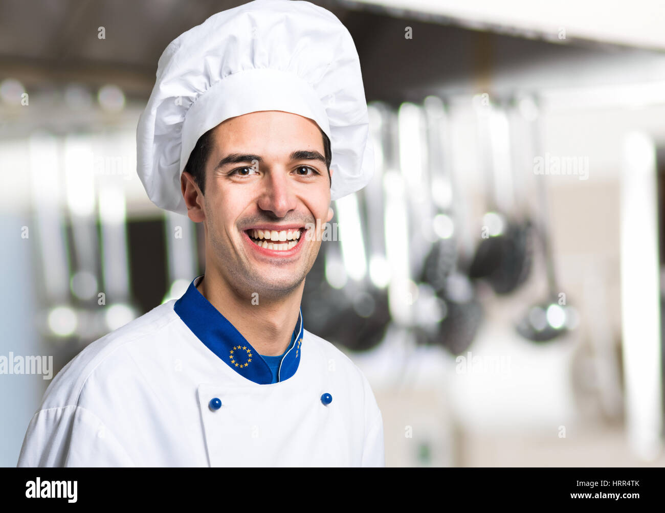 Young chef in a kitchen Stock Photo - Alamy
