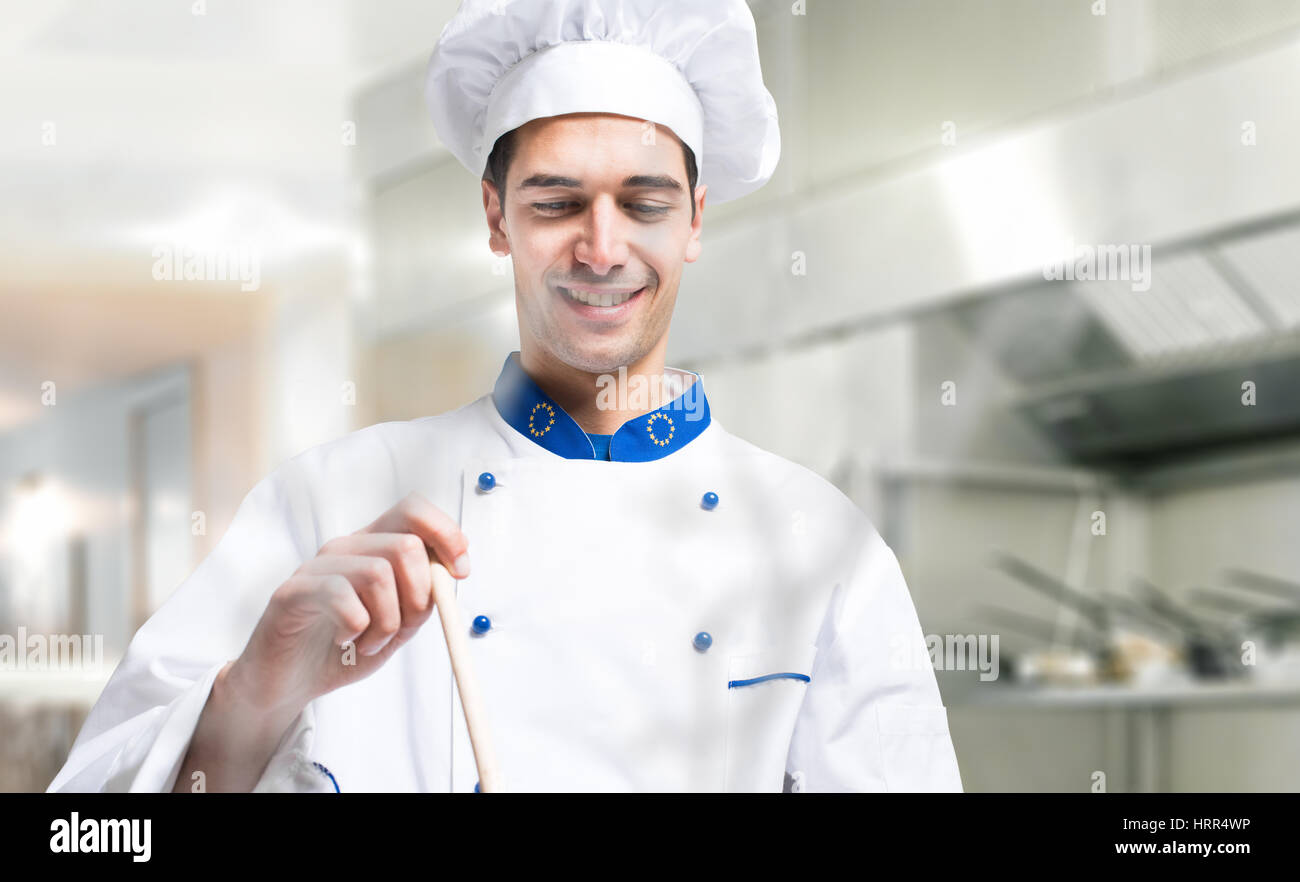 Chef cooking in his kitchen Stock Photo - Alamy