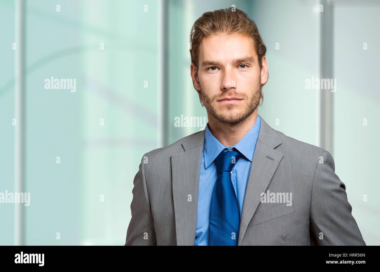 Handsome manager portrait Stock Photo - Alamy