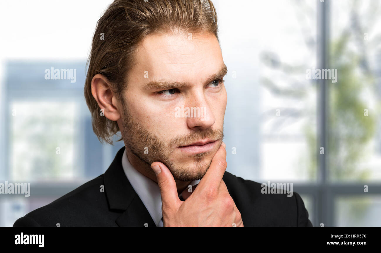 Thoughtful manager hi-res stock photography and images - Alamy