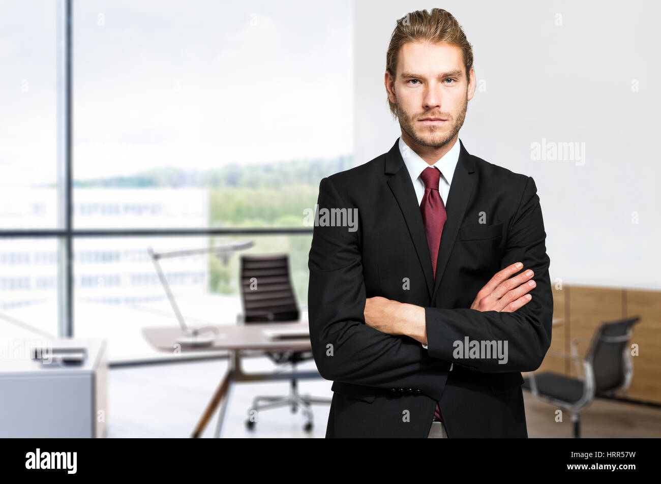 Handsome manager portrait Stock Photo - Alamy