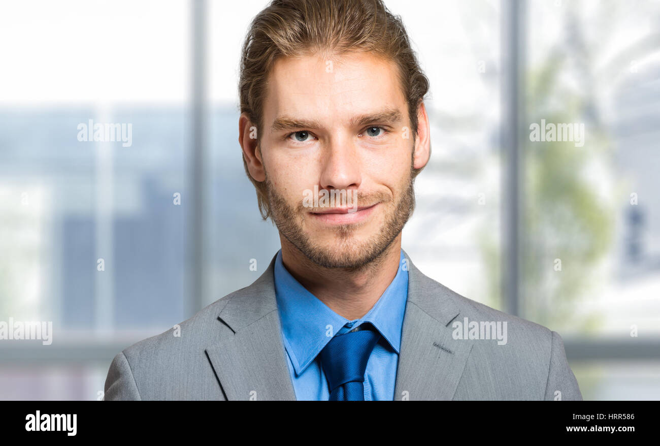Handsome manager portrait Stock Photo - Alamy