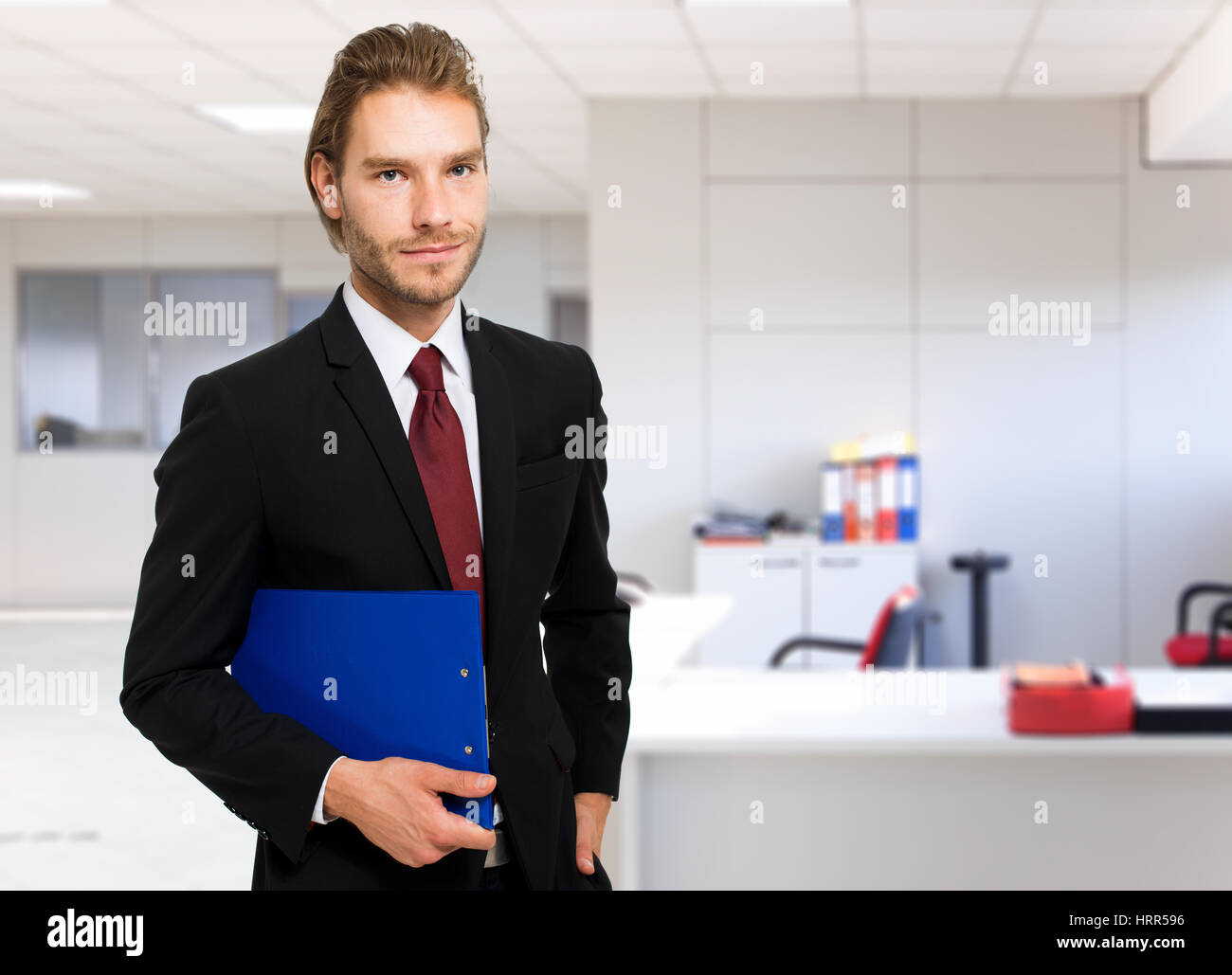 Handsome manager portrait Stock Photo - Alamy