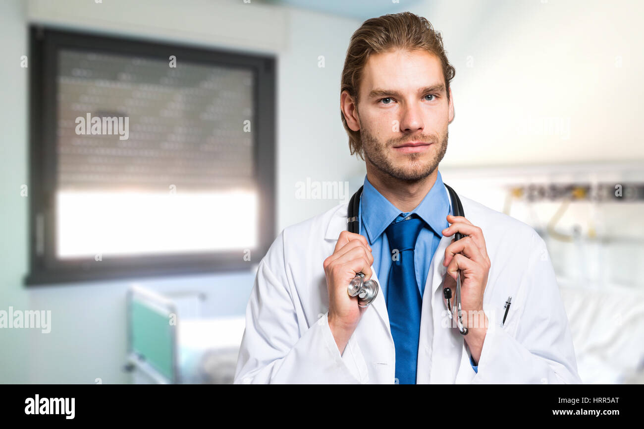 Handsome doctor hi-res stock photography and images - Alamy