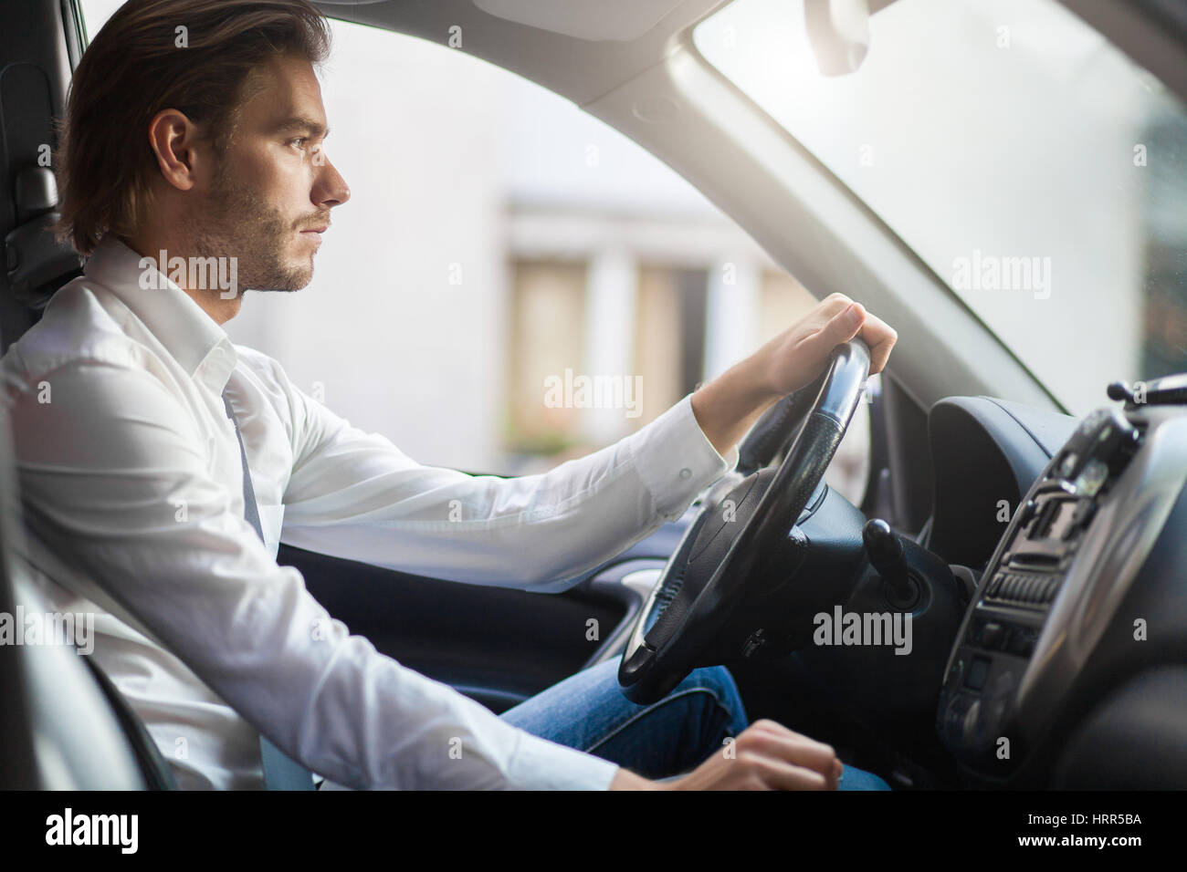 Man driving his car Stock Photo - Alamy