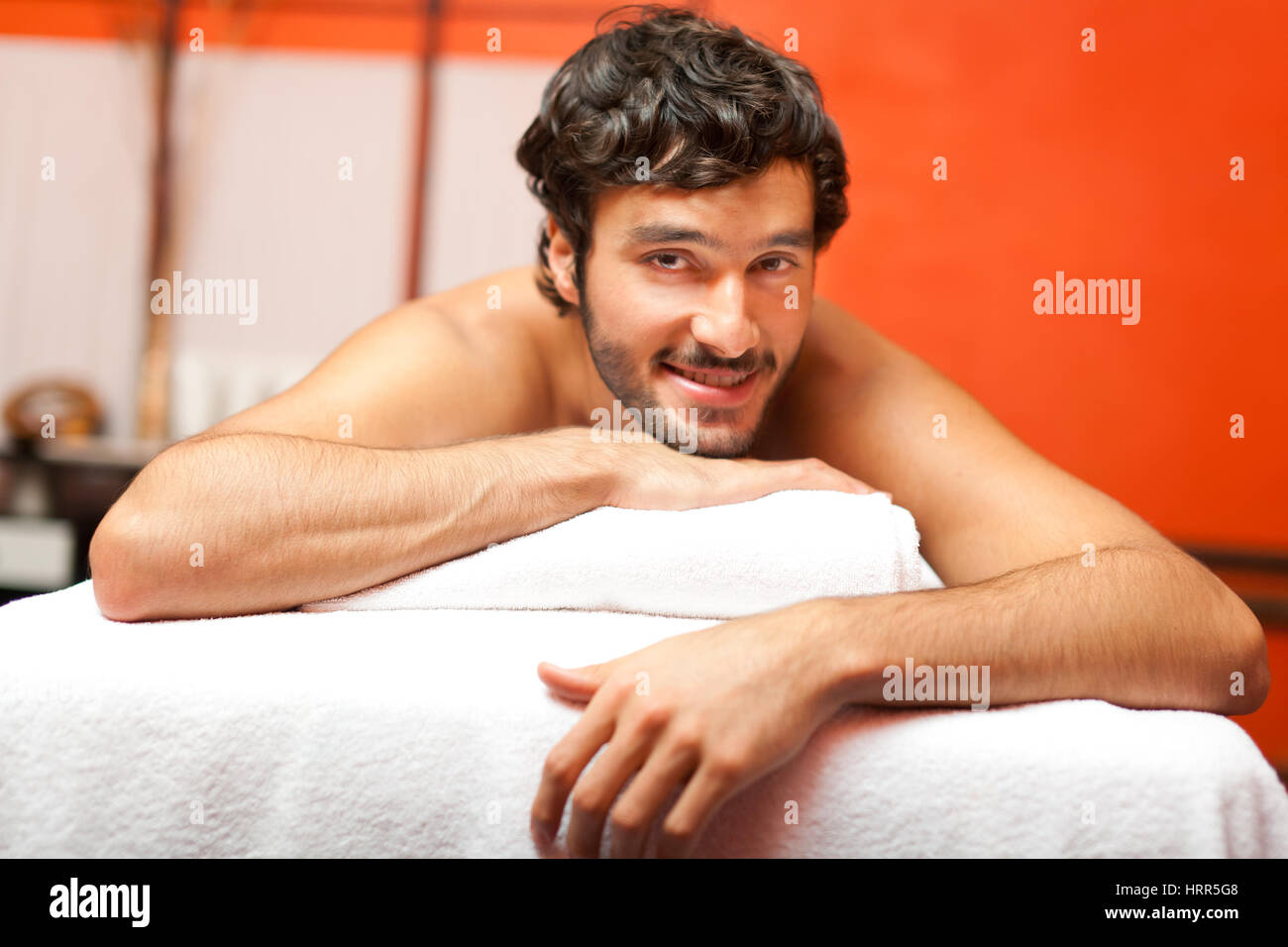 Man relaxing in a spa Stock Photo - Alamy