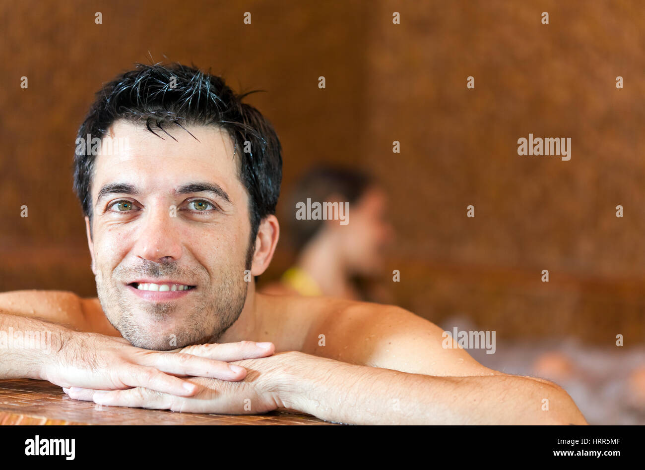 Man relaxing in a spa Stock Photo - Alamy