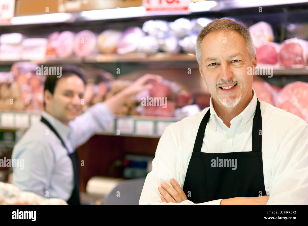Men at work in a grocery store Stock Photo - Alamy