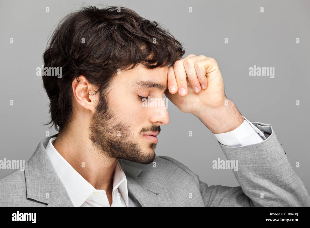 Portrait of a pensive businessman Stock Photo - Alamy