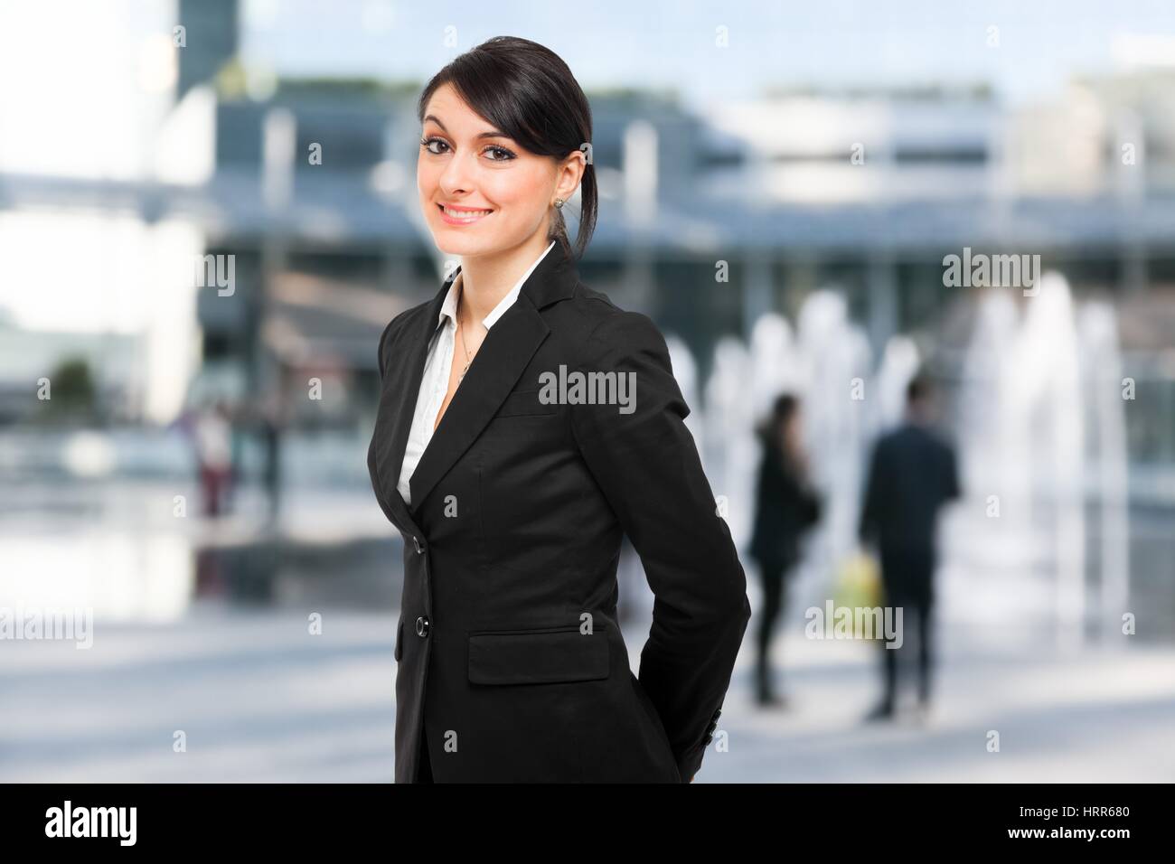 Smiling business woman portrait Stock Photo - Alamy