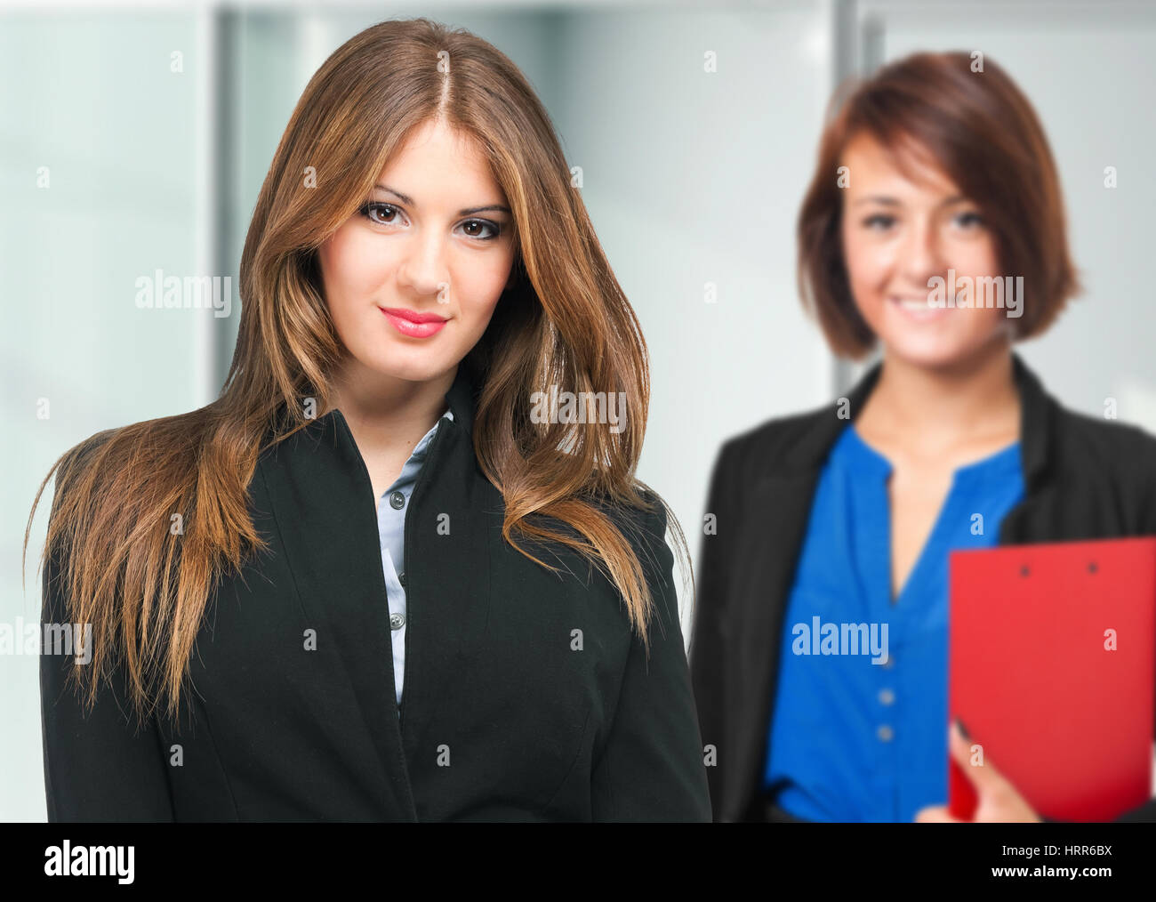 Couple of female managers in the office Stock Photo - Alamy
